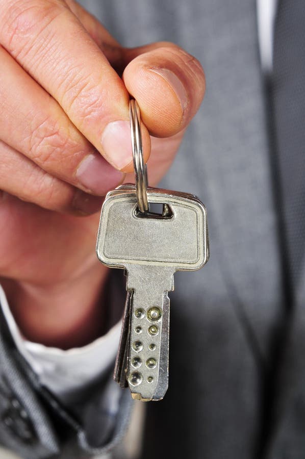 Man in Suit Showing a Key Ring Stock Image - Image of agency, house ...