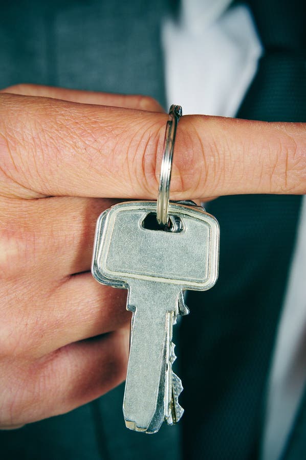 Man in Suit Showing a Key Ring Stock Image - Image of banker, chain ...
