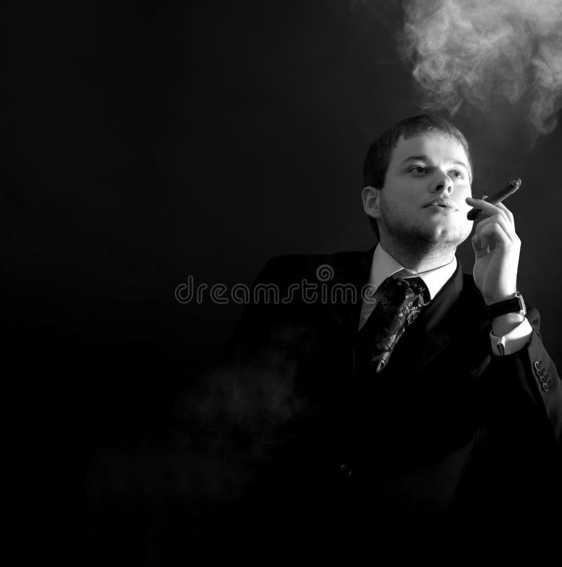 Man in a Suit Smoking Cigar Stock Photo - Image of addict, blowing ...
