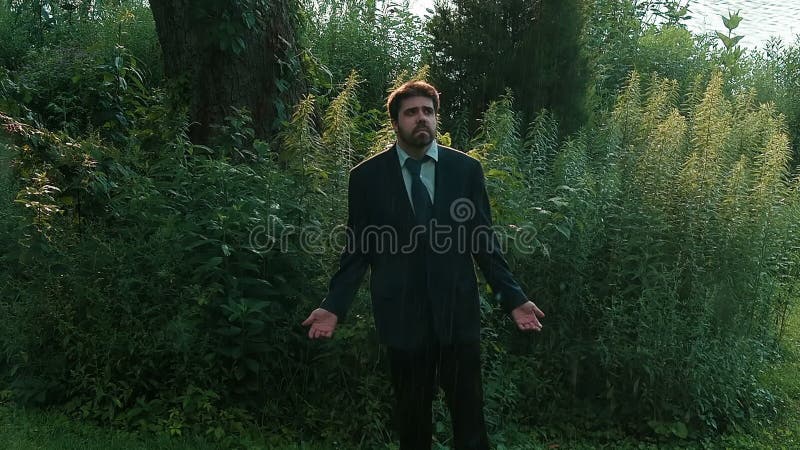 Man Standing in Rain Outside Stock Footage - Video of standing, person ...