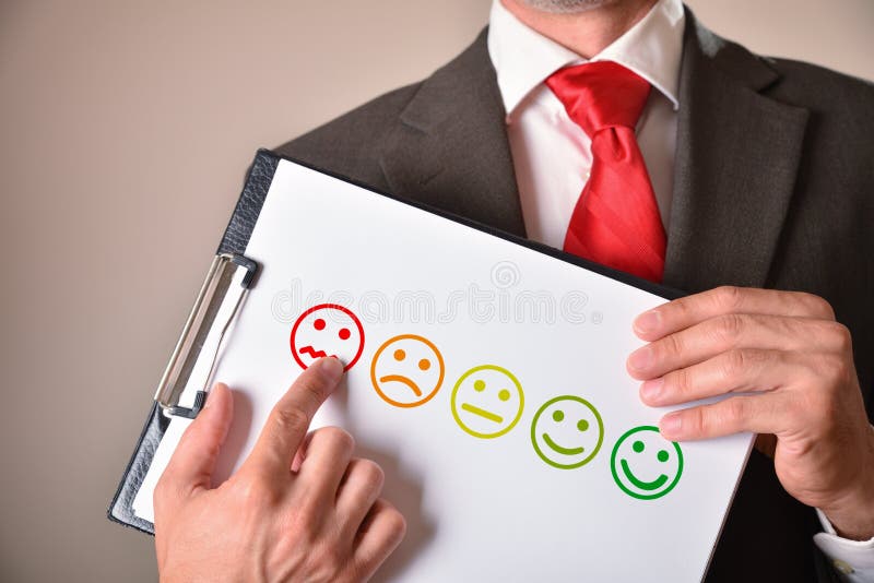 Man Showing Angry Face Emoticons Drawn on a Sheet Stock Image - Image ...