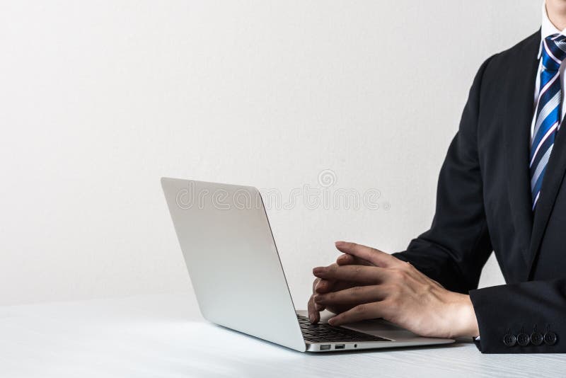 A Man in a Suit Watching a PC Stock Image - Image of space, negotiating ...