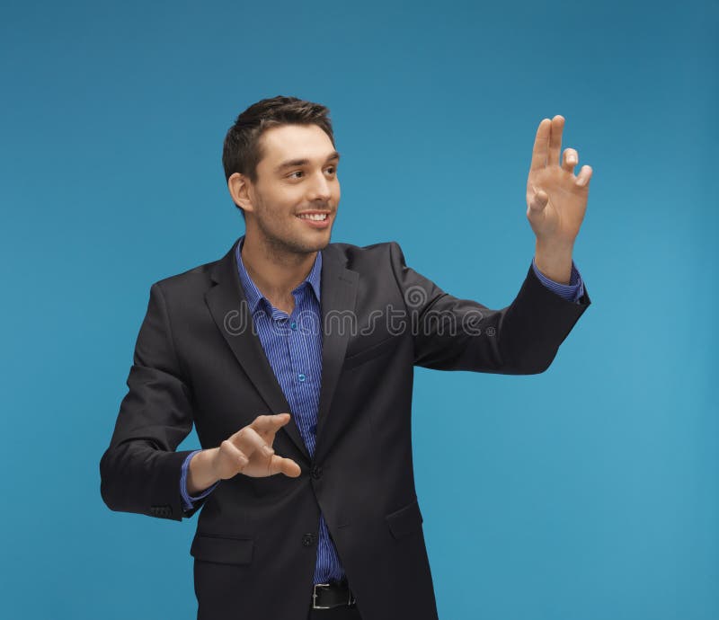 Man in Suit Working with Something Imaginary Stock Photo - Image of ...