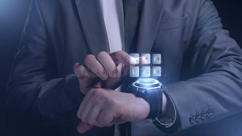 A Man in a Suit Works with the Smart Watch of the Future Stock Video ...