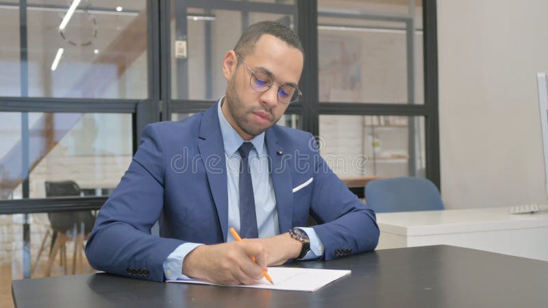 Man in Suit Writing a Letter in Office Stock Image - Image of gesturing ...