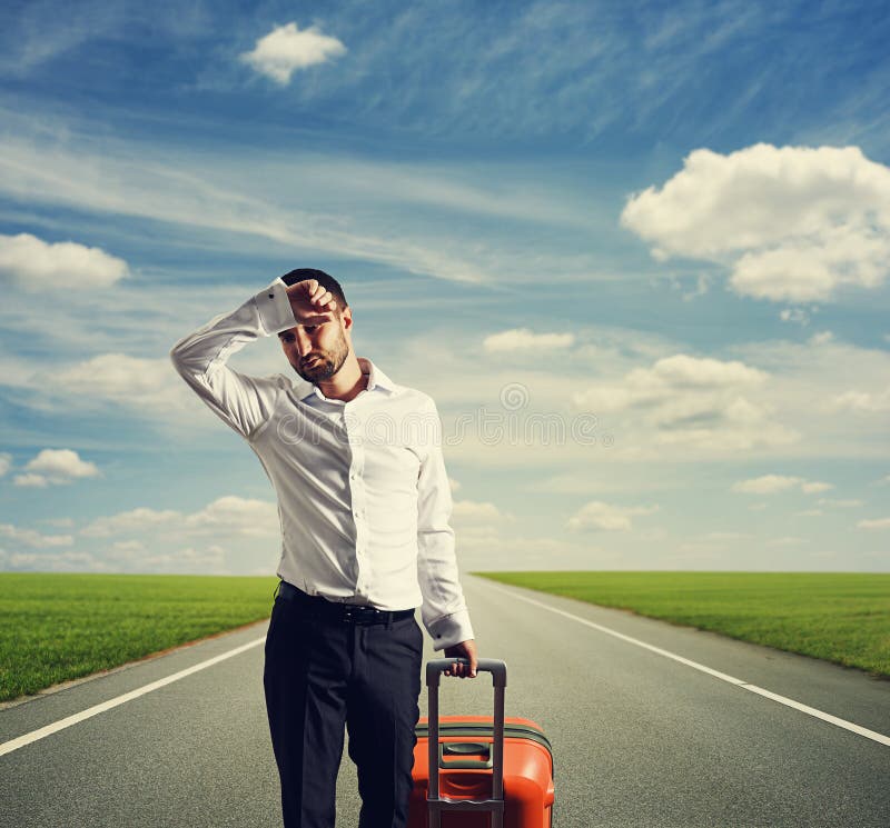 Man with Suitcase on a Road Stock Image - Image of freeway, long: 33016763