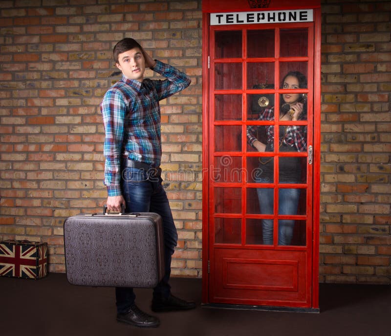 Man with Suitcase Waiting at the Telephone Booth Stock Image - Image of ...