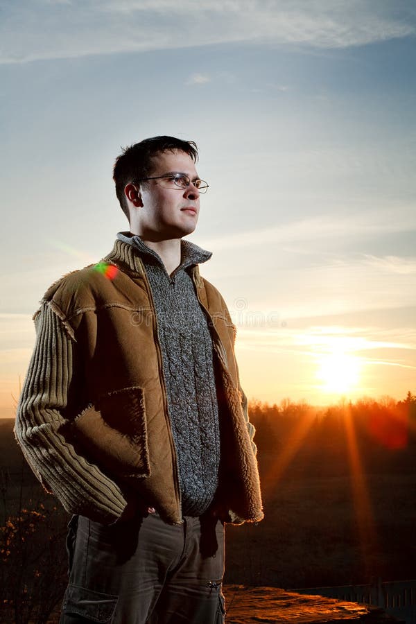 Man at sunset stock photo. Image of adult, young, hands - 17905712