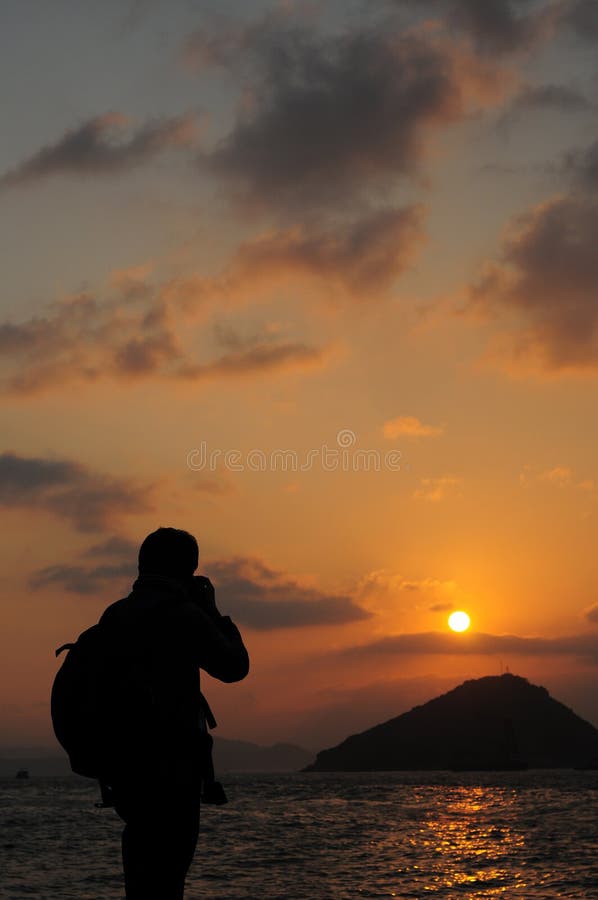 A man in sunset stock photo. Image of landscape, photograph - 29268172
