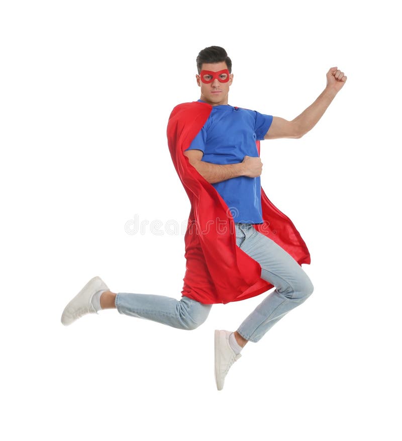 Man in Superhero Cape and Mask Jumping on White Background Stock Photo ...