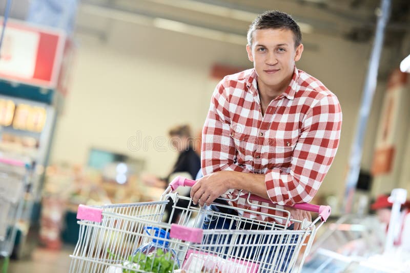 Man at Supermarket Dairy Shopping Stock Photo - Image of male, choosing ...