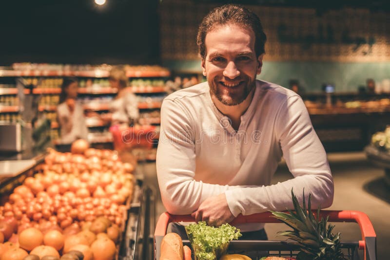 Man at the supermarket stock photo. Image of grocery - 89565956