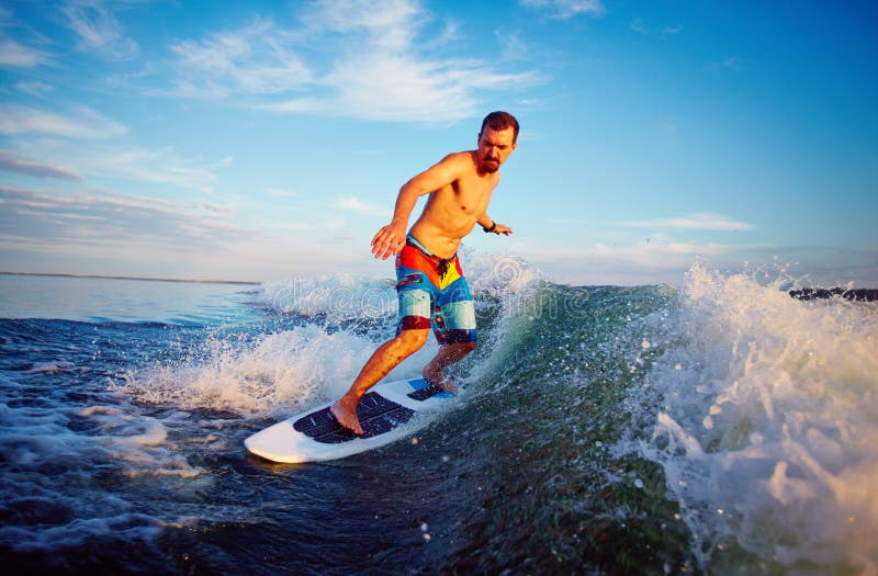 Sportsman surfboarding stock photo. Image of practicing - 59341188