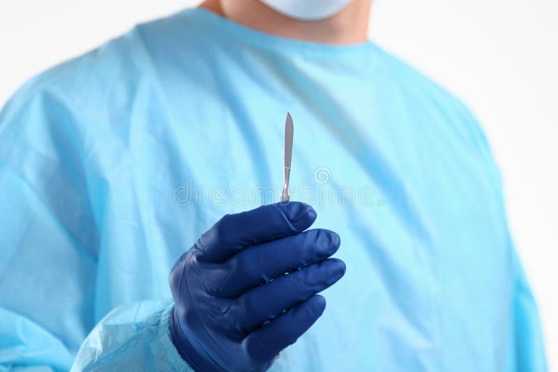 Surgeon Hand Hold Scalpel and Tweezers while Cut Cure Wound Closeup ...