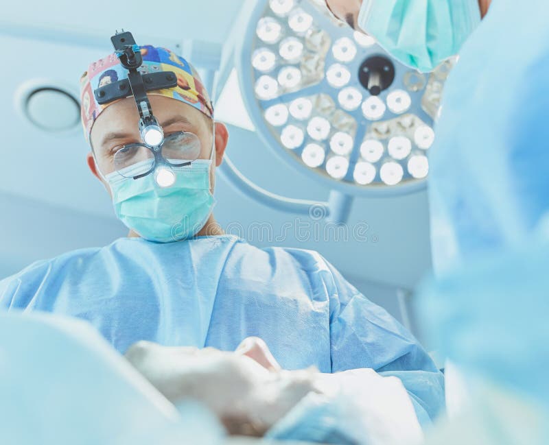 Man Surgeon at Work in Operating Room Stock Photo - Image of clinic ...