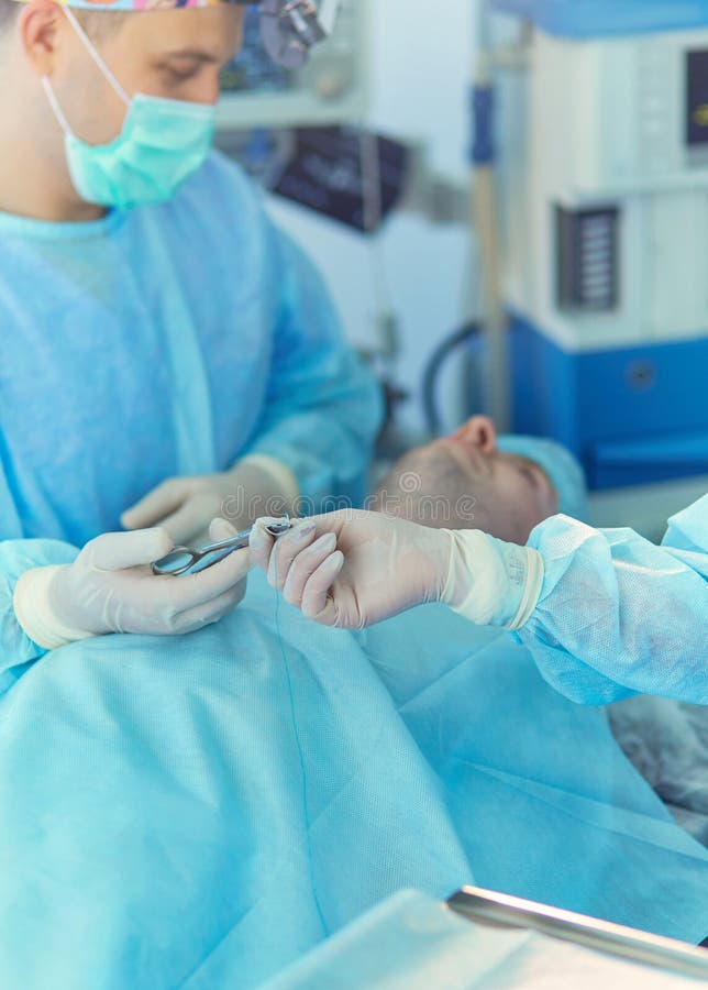 Man Surgeon at Work in Operating Room Stock Photo - Image of clinic ...