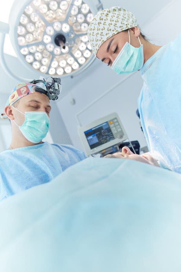 Man Surgeon at Work in Operating Room Stock Photo - Image of person ...