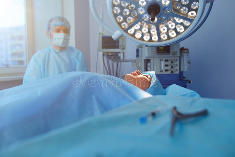 Man Surgeon at Work in Operating Room Stock Image - Image of coat ...