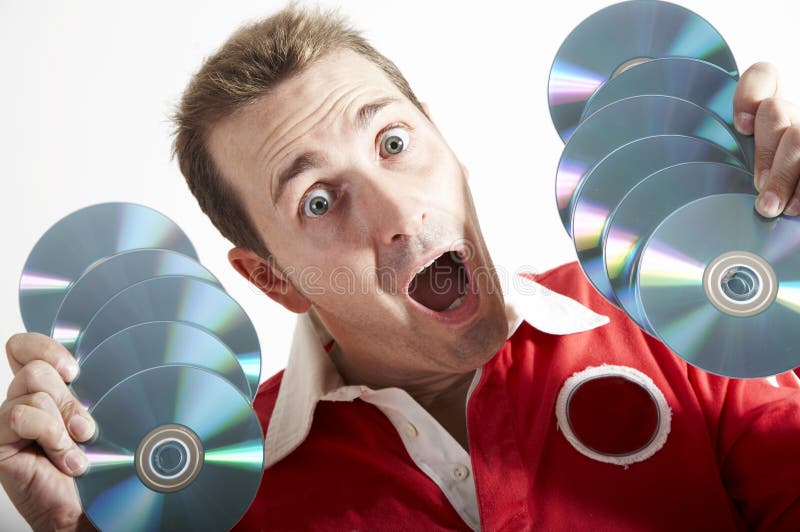 Man holding a cd stock photo. Image of shirt, technology - 17083732