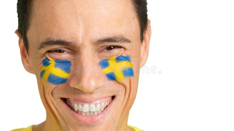 Man with a Swedish Flag Painted on the Face Smiling Stock Image - Image ...