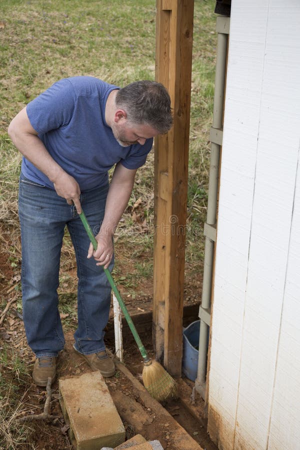 Man Sweeping Dirt with Broom Stock Image - Image of work, adult: 59530135