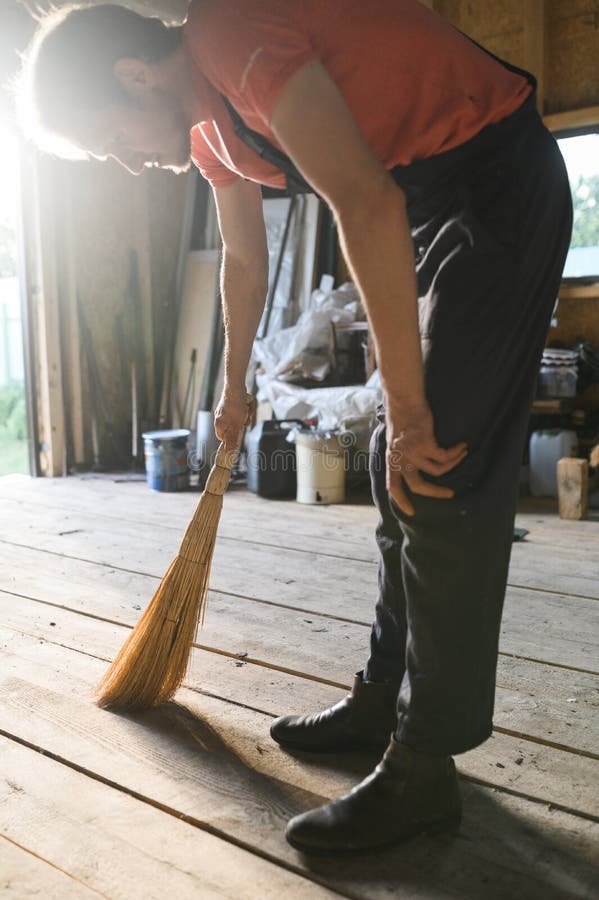 Man Sweeps the Wood Floor. Barn Cleaning Stock Photo - Image of broom ...