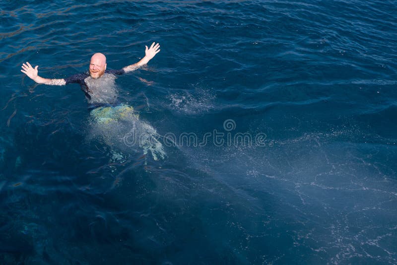Man swimming in ocean stock photo. Image of exercise - 103621876
