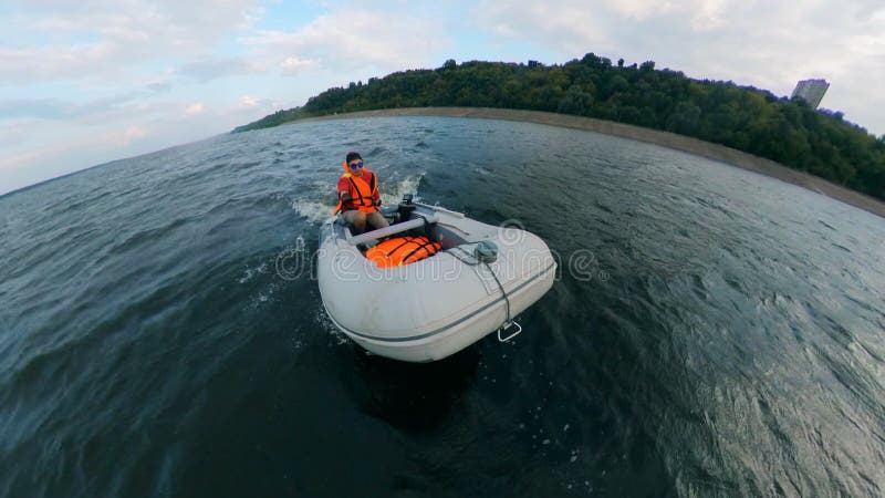 A Man is Swimming in a Dinghy in a Front View Stock Video - Video of ...