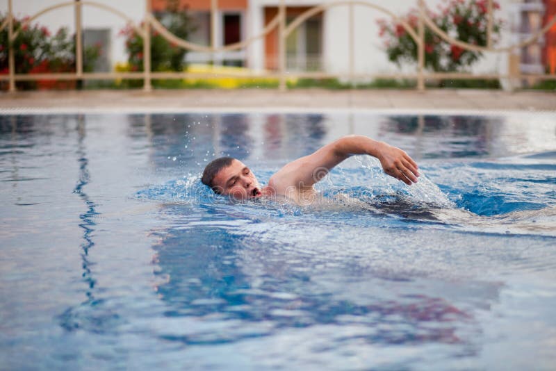 Man swimming in pool stock image. Image of sportman, vitality - 17873977