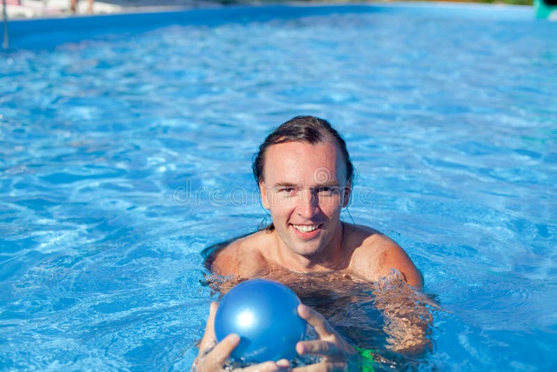 Man in swimming pool stock photo. Image of people, cheerful - 9851596