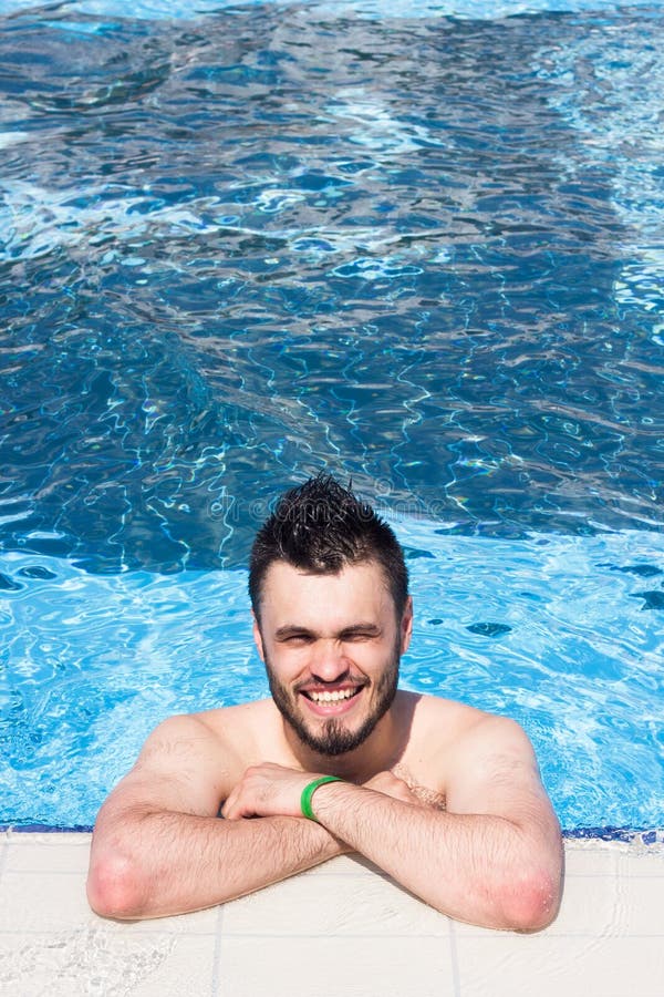 Attractive Man in the Pool with a Cocktail. Stock Photo - Image of ...