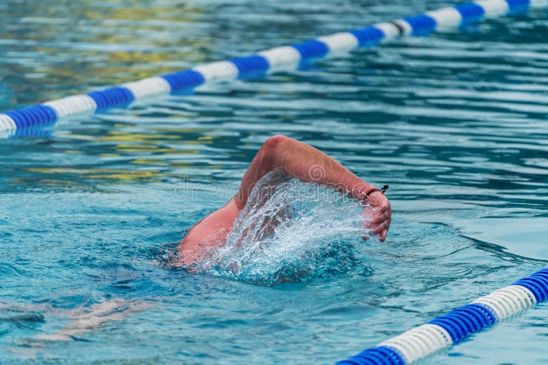 Man swimming in a pool stock photo. Image of water, adult - 136969652