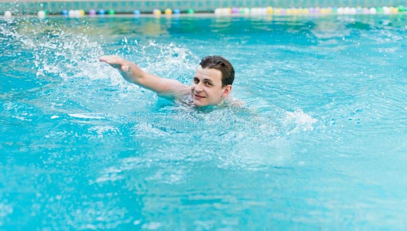 Man swimming in pool stock image. Image of closeup, health - 39491185