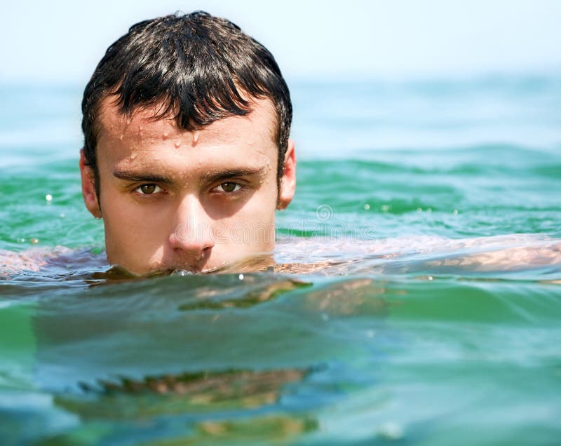 Man swimming sea stock image. Image of looking, summer - 18393927