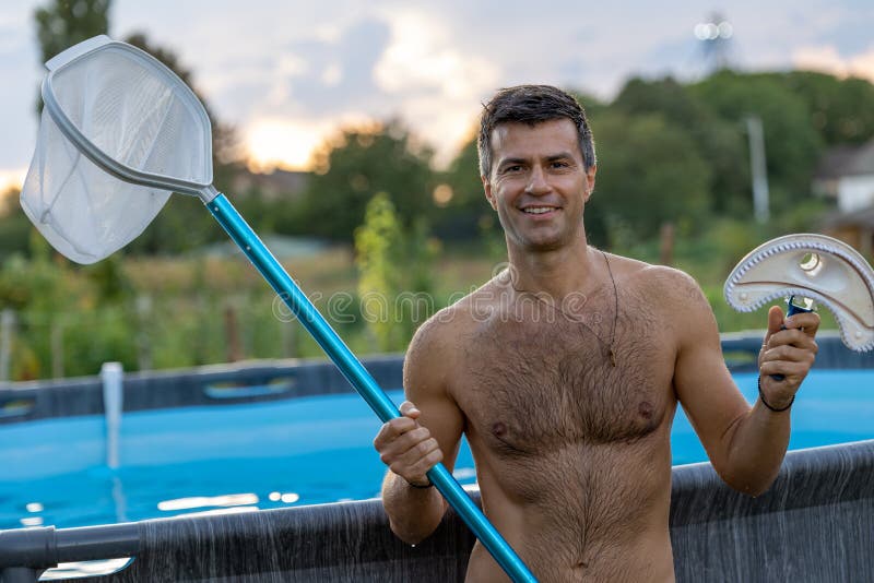 Man Holding Pool Cleaning Tools Stock Photo - Image of lifestyle ...