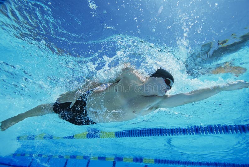 Man Swimming Underwater stock photo. Image of effort - 30842014