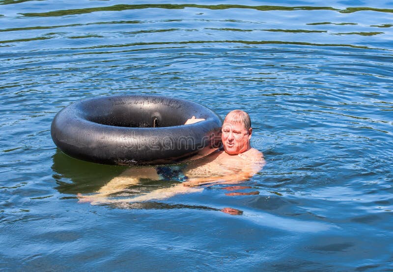 Adult Inner Tubes Pool Stock Photos - Free & Royalty-Free Stock Photos ...