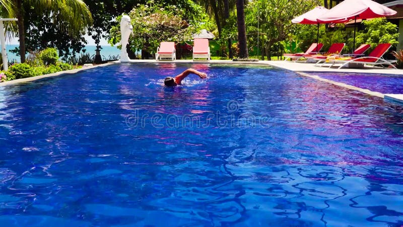 The man swims in the pool. stock video. Video of tourism - 221899787 The man swims in the pool. stock video. Video of tourism - 221899787