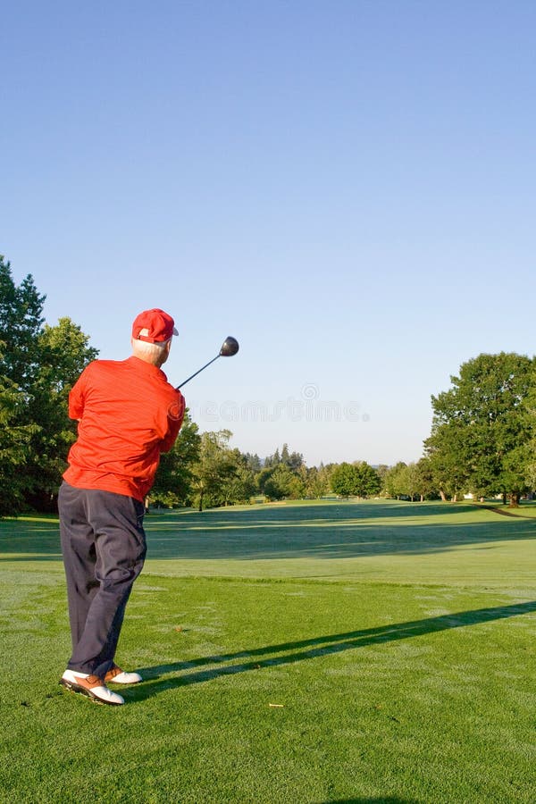 Man Swinging Golf Club stock image. Image of putt, fairway - 6107009