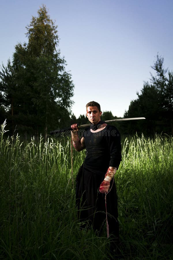 Man with sword stock photo. Image of assassin, antique - 81343892