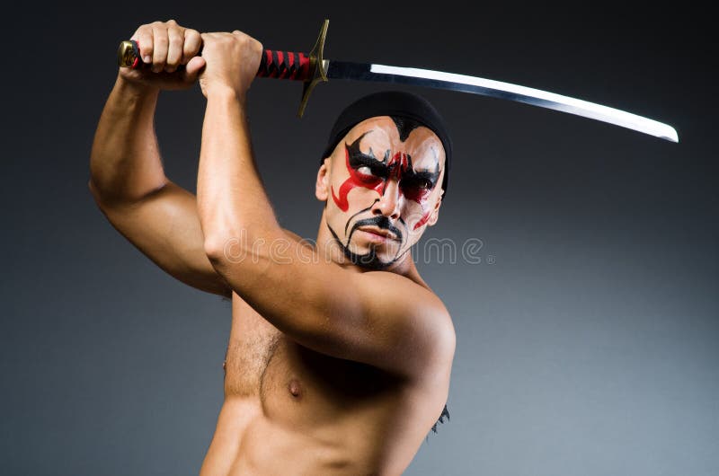 Man with sword stock image. Image of clothing, martial - 33350139
