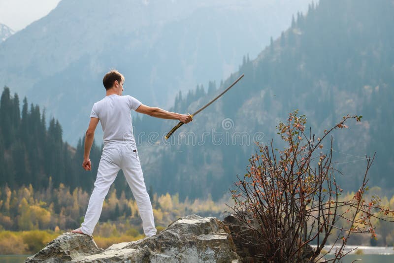 A Man with a Sword Goes on the Attack on the Enemy. the Emotional ...