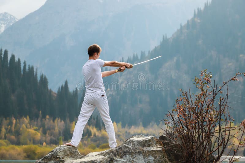 A Man with a Sword Goes on the Attack on the Enemy. the Emotional ...