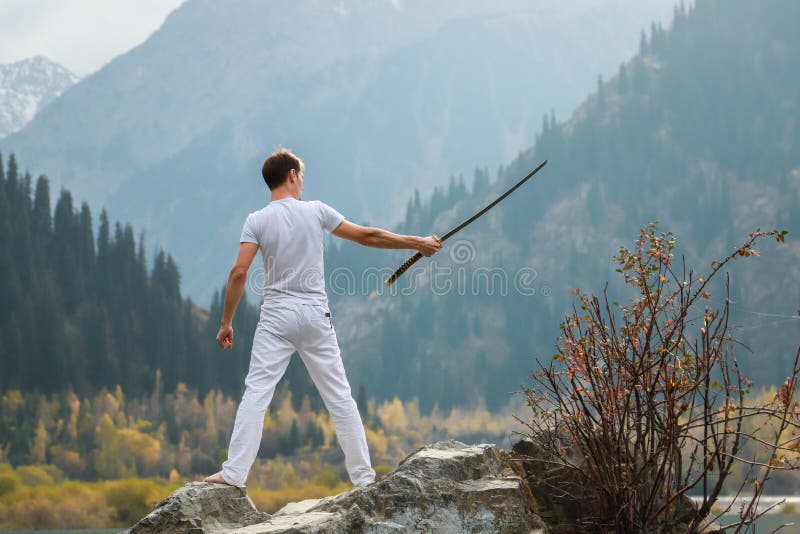A Man with a Sword Goes on the Attack on the Enemy. the Emotional ...