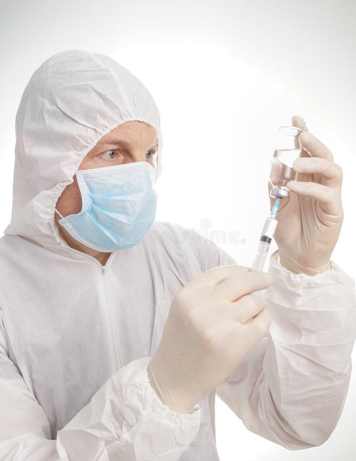 Man with syringe and vial stock photo. Image of defense - 48658322