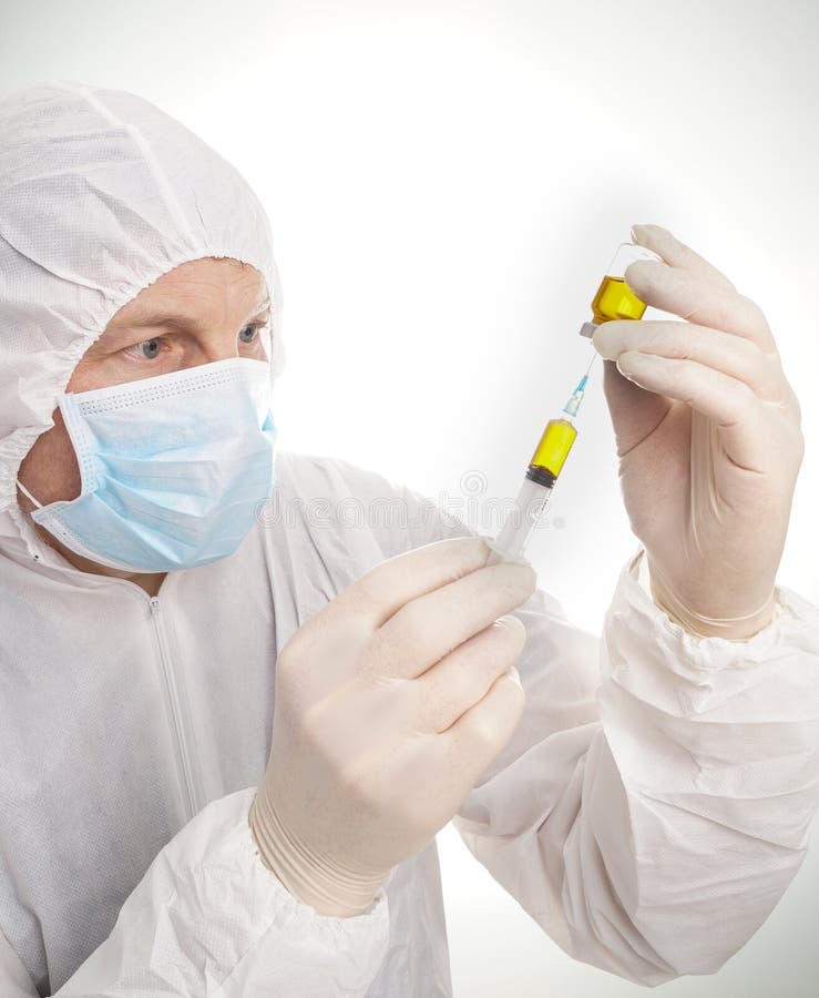 Man with syringe and vial stock photo. Image of health - 48658370