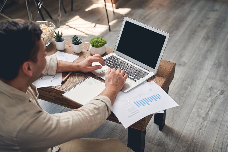 Man at the Table Getting Ready for Work Stock Photo - Image of ...