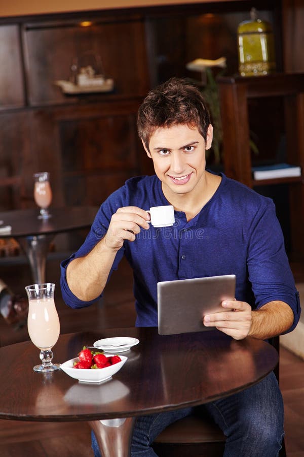 Man with Tablet Computer Drinking Coffee Stock Photo - Image of drink ...