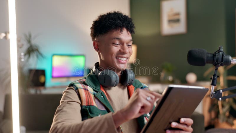 Man, Tablet and Laughing in Recording Studio for Meme, Streaming and ...