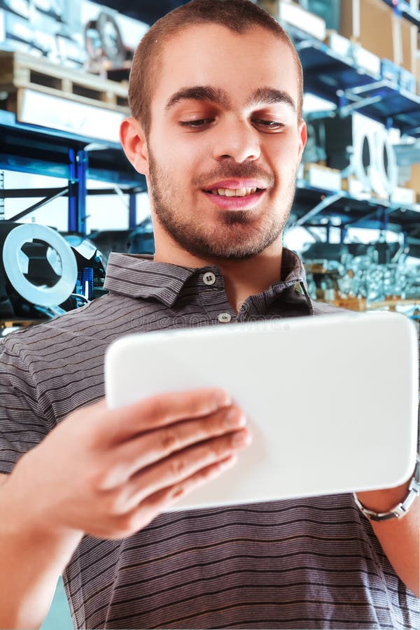 Man with Tablet Manages Warehouse Stock Stock Photo - Image of ...